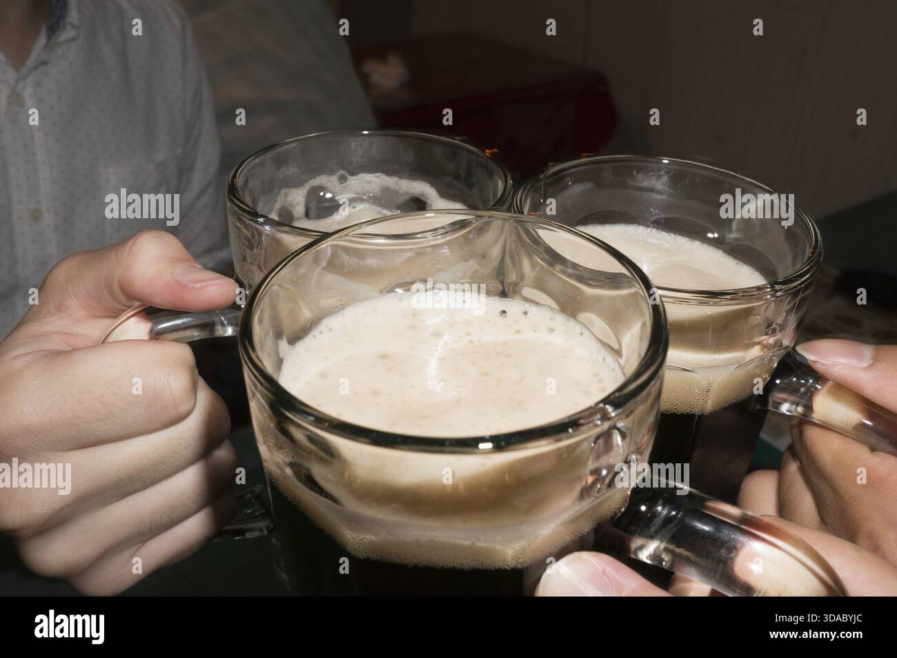 Putting beer in glass hi-res stock photography and images - Alamy