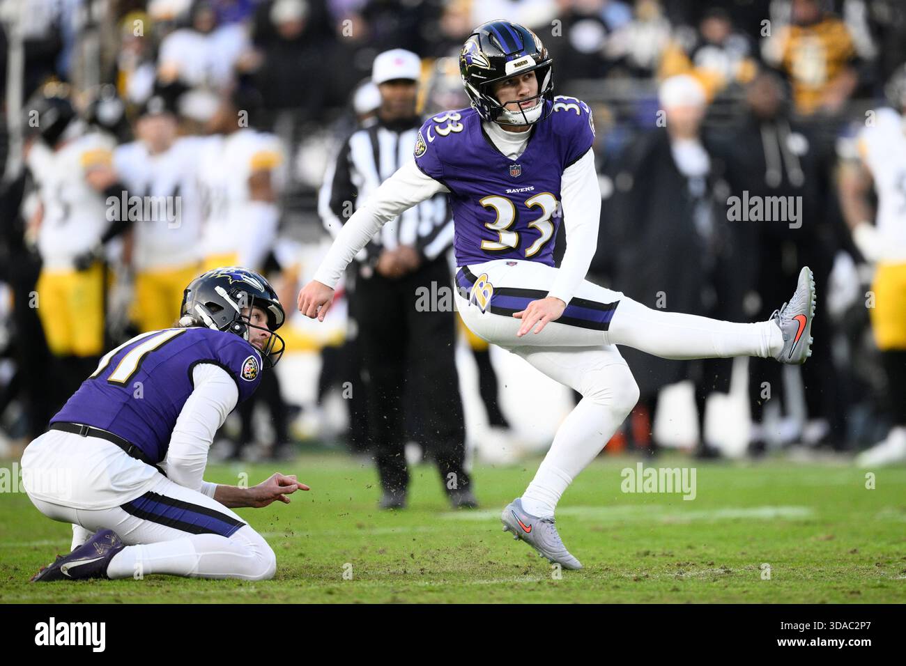 Baltimore Ravens place kicker Tyler Loop (33) in action during the ...