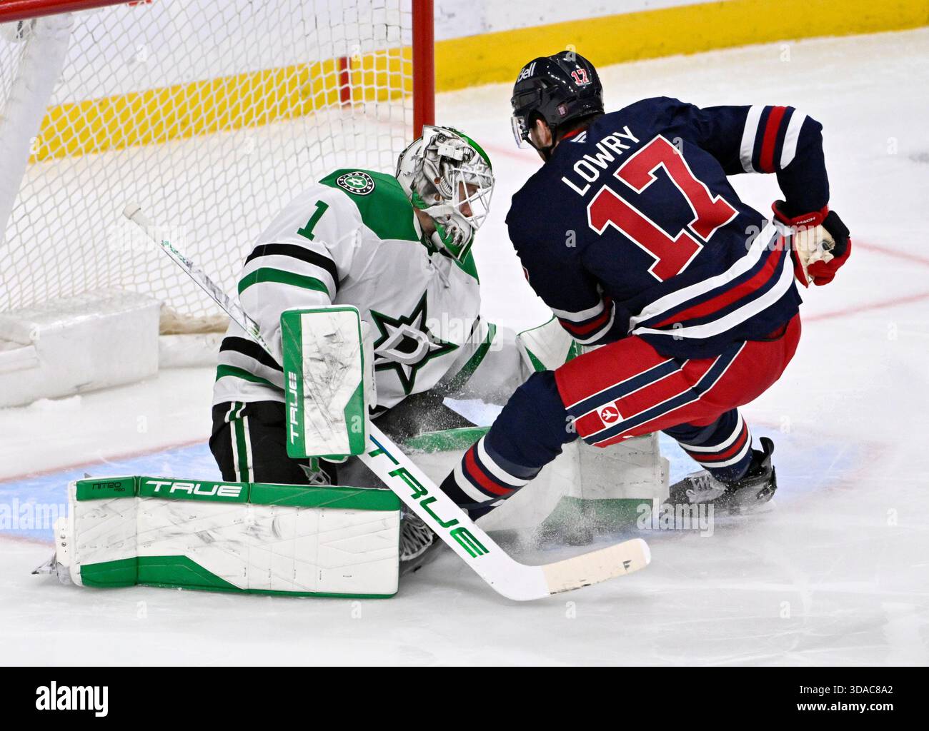Dallas Stars' goaltender Casey DeSmith (1) makes a save on Winnipeg ...