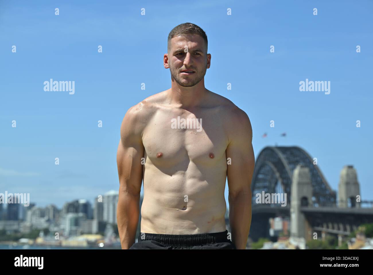 Wests Tigers NRL player Adam Doueihi in an inflatable pool advertising ...