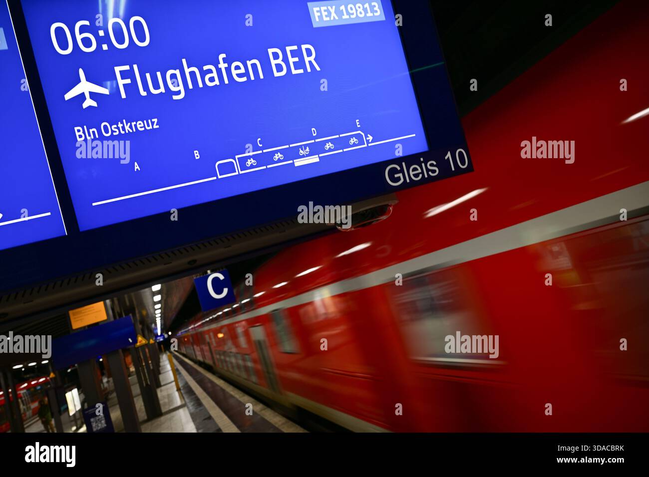 10 December 2025, Berlin: The Airport Express FEX in the direction of ...