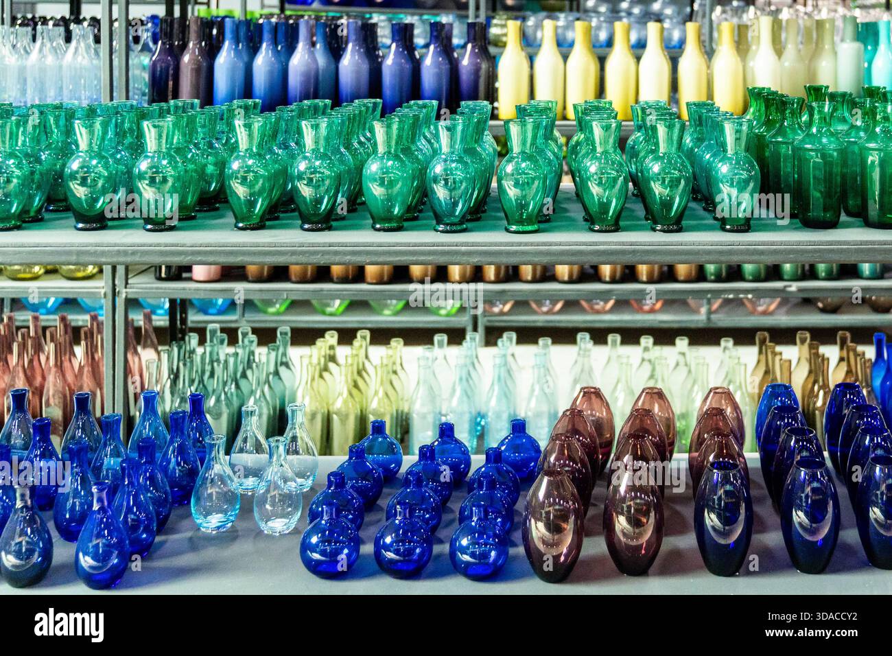 A view of various colorful handmade glassware in the showroom, at ...