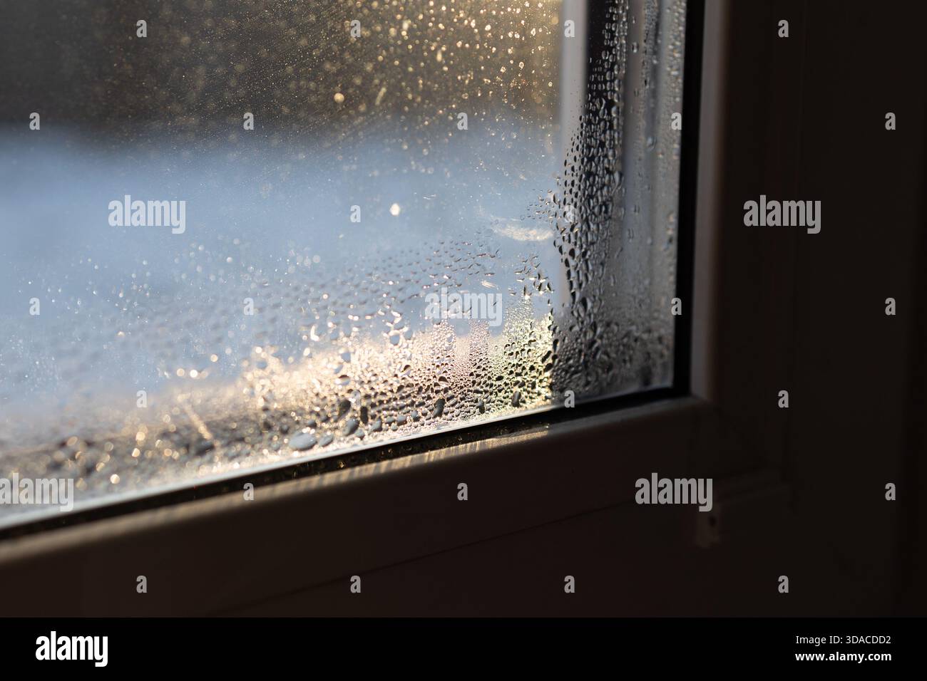 Condensation forms on a window, showing the need for proper ventilation ...