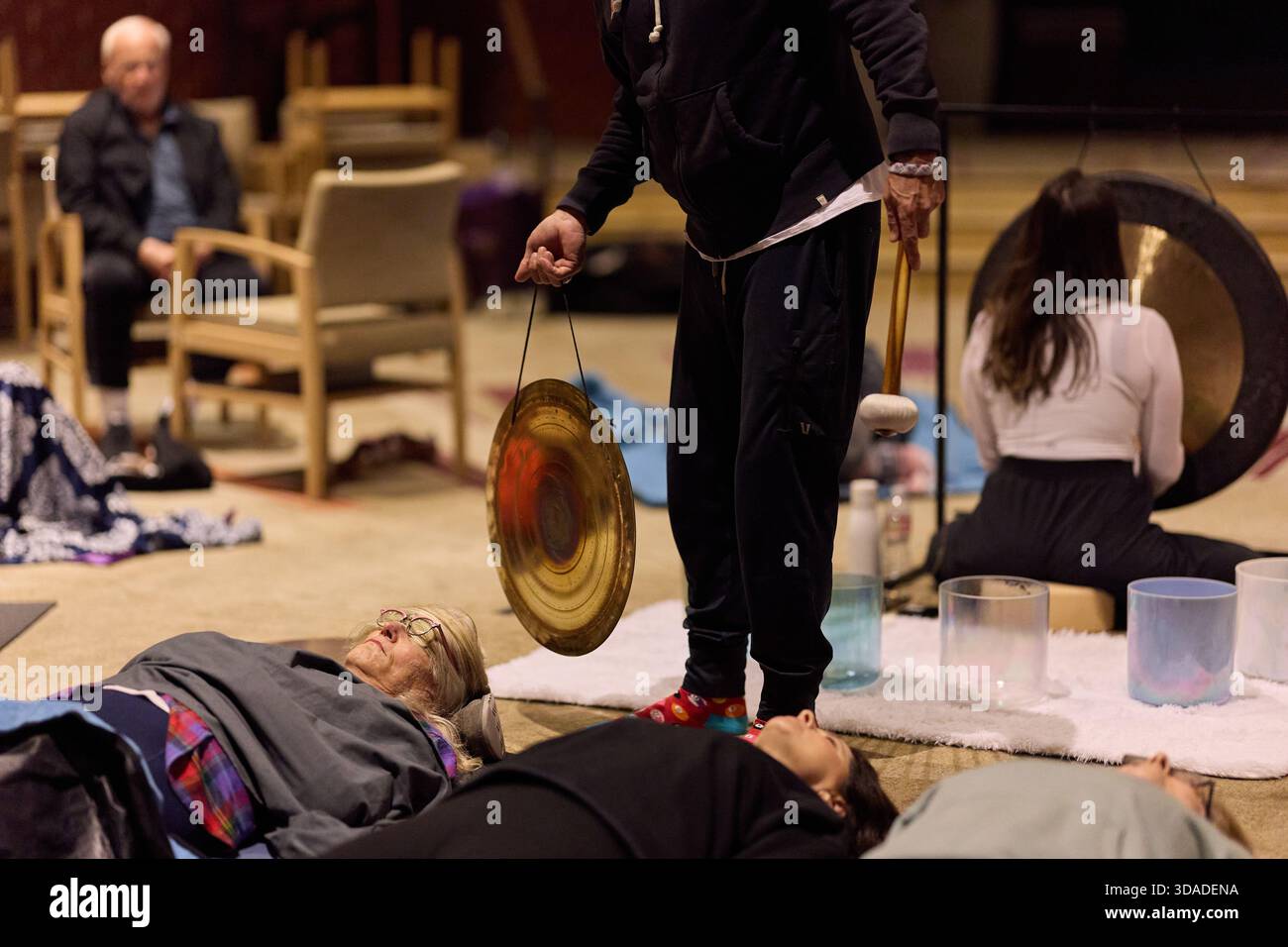 Rabbi Jonathan Aaron participates in a sound bath at Temple Emanuel ...