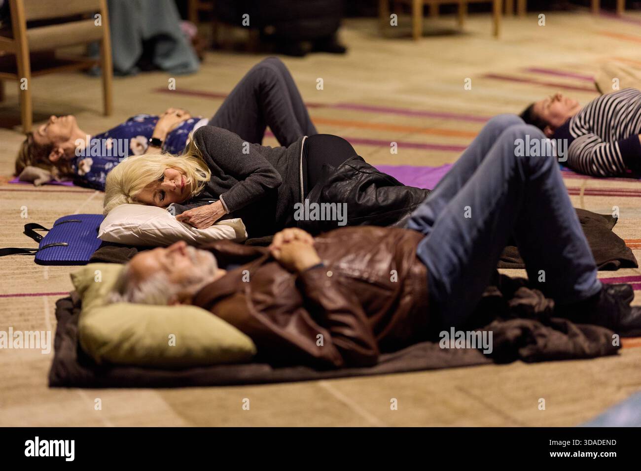 People partake in a sound bath at Temple Emanuel, Saturday, Dec. 6 ...