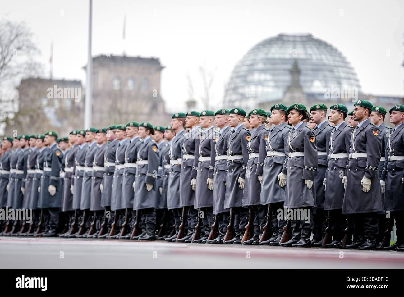 10 December 2025, Berlin: The guard battalion awaits the military ...