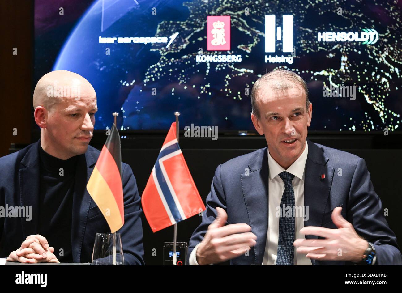 10 December 2025, Berlin: Gundbert Scherf (l), CEO of Helsing, and ...