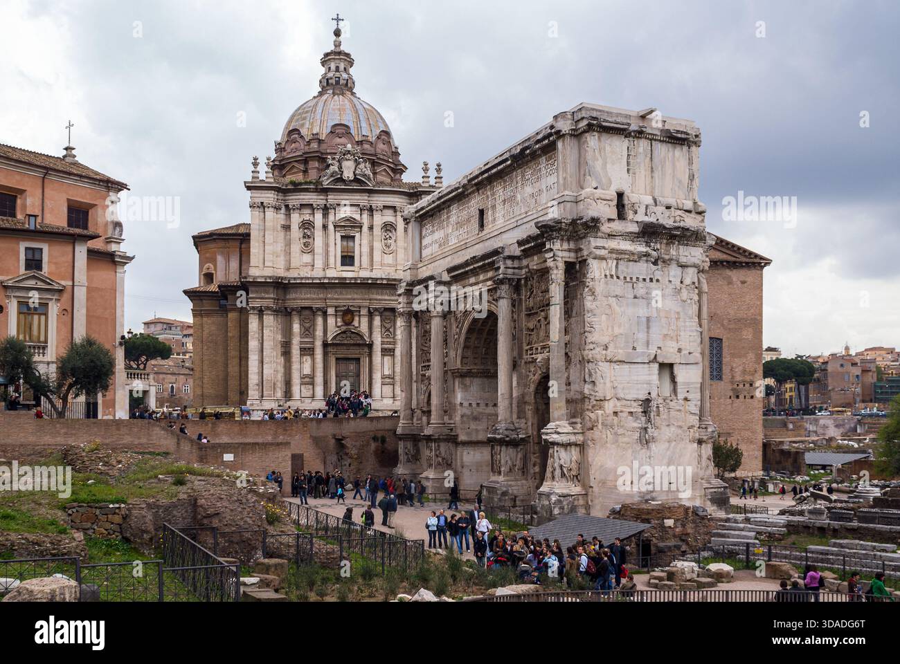 View of the Arch of Septimius Severus and the baroque facade of the ...