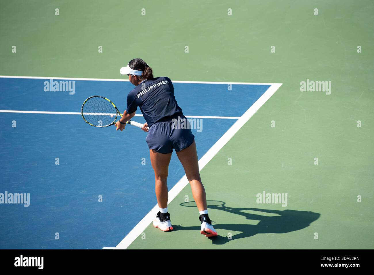 Alexa MILLIAM (BLACK) of Philippines Serve tennis balls against Nguyen ...