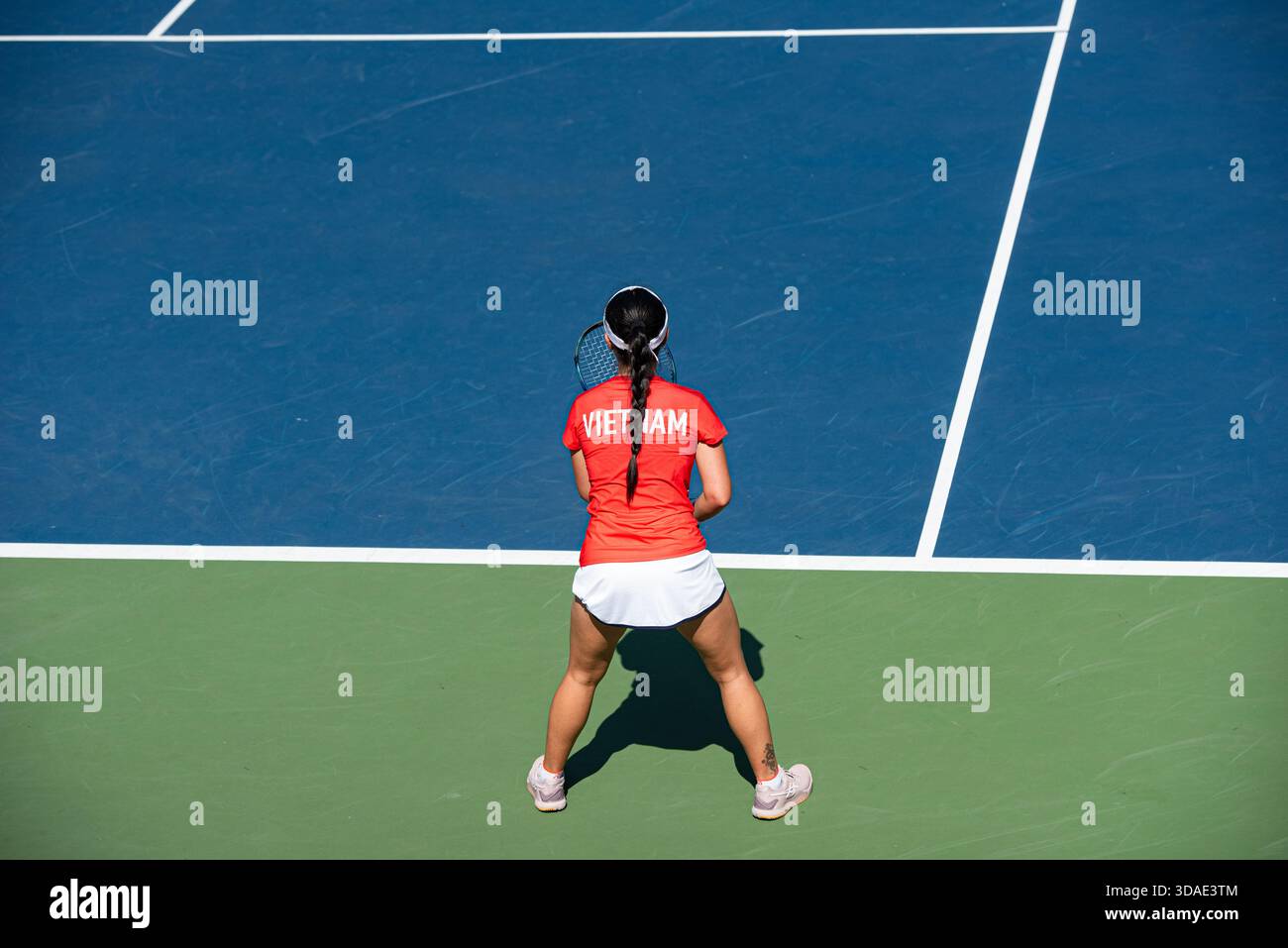 Nguyen LY (RED) of Vietnam during their match Tennis Women Team Finals ...