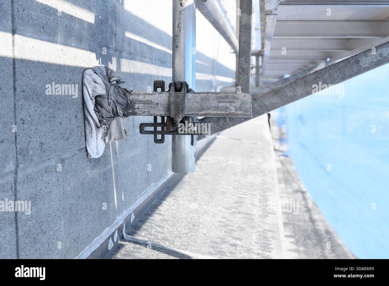 Scaffolding wall tie system. Tie bar with cloth on firewall. Temporary ...