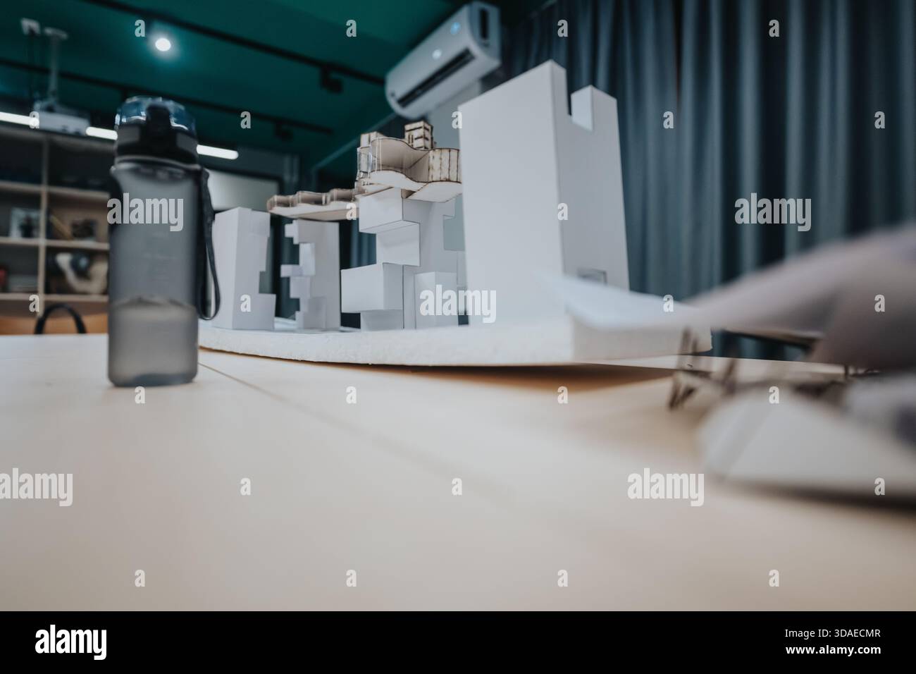 Architectural model on a desk at the collaboration center showing an ...