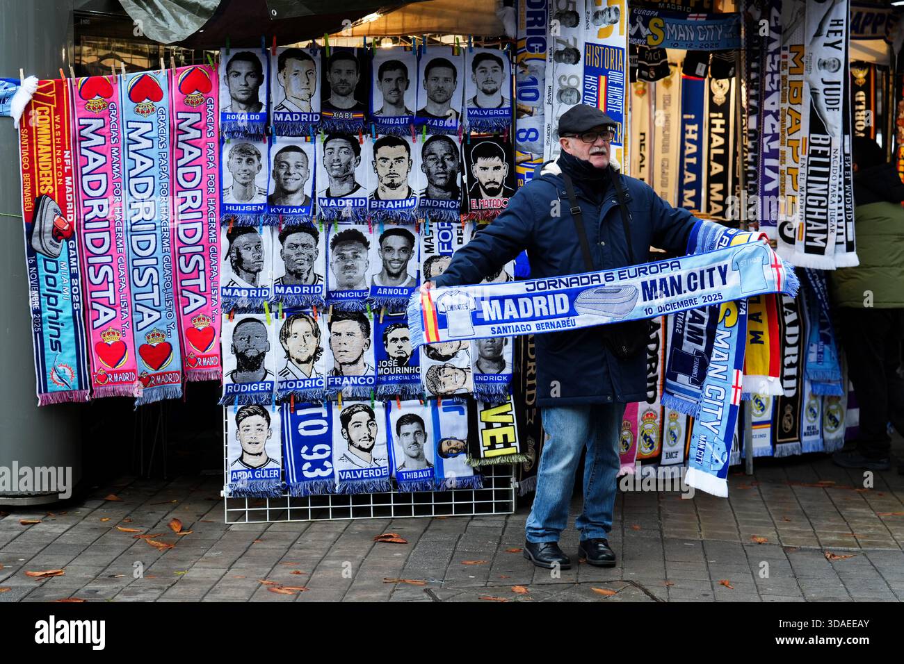 A street vendor selling merchandise ahead of the UEFA Champions League ...