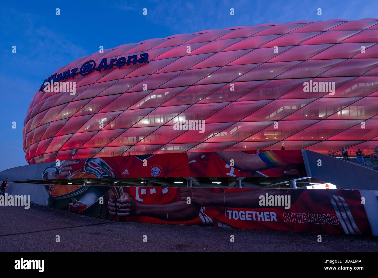 Exterior of the Allianz Arena, in front of a wall with the inscription ...