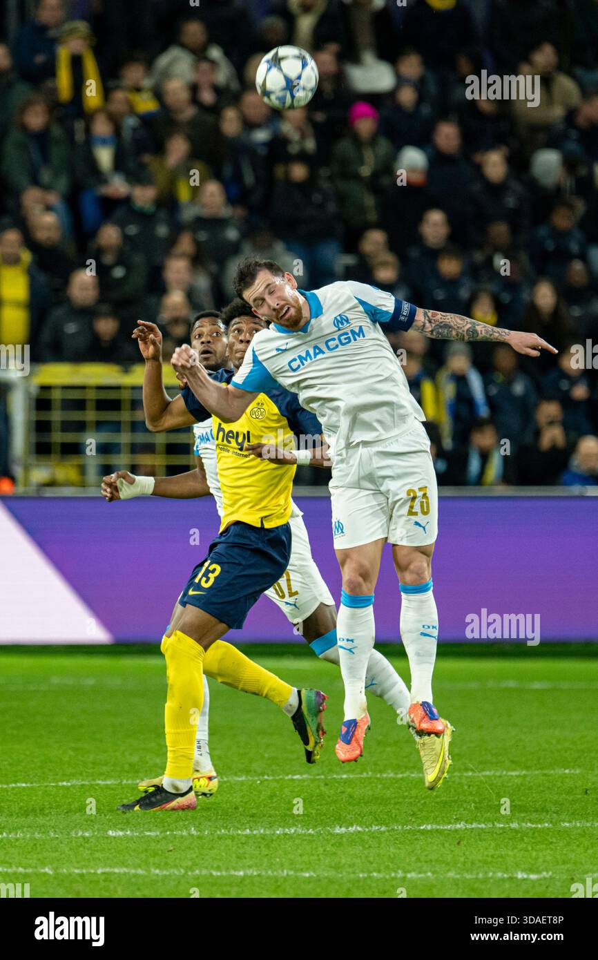 Pierre-Emile Højbjerg of Marseille jumps for the ball with Kevin ...