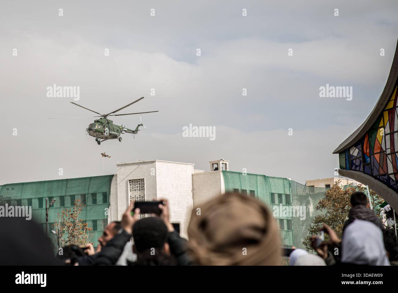 December 9, 2025, Damascus, Syria: A man drops from a helicopter in ...