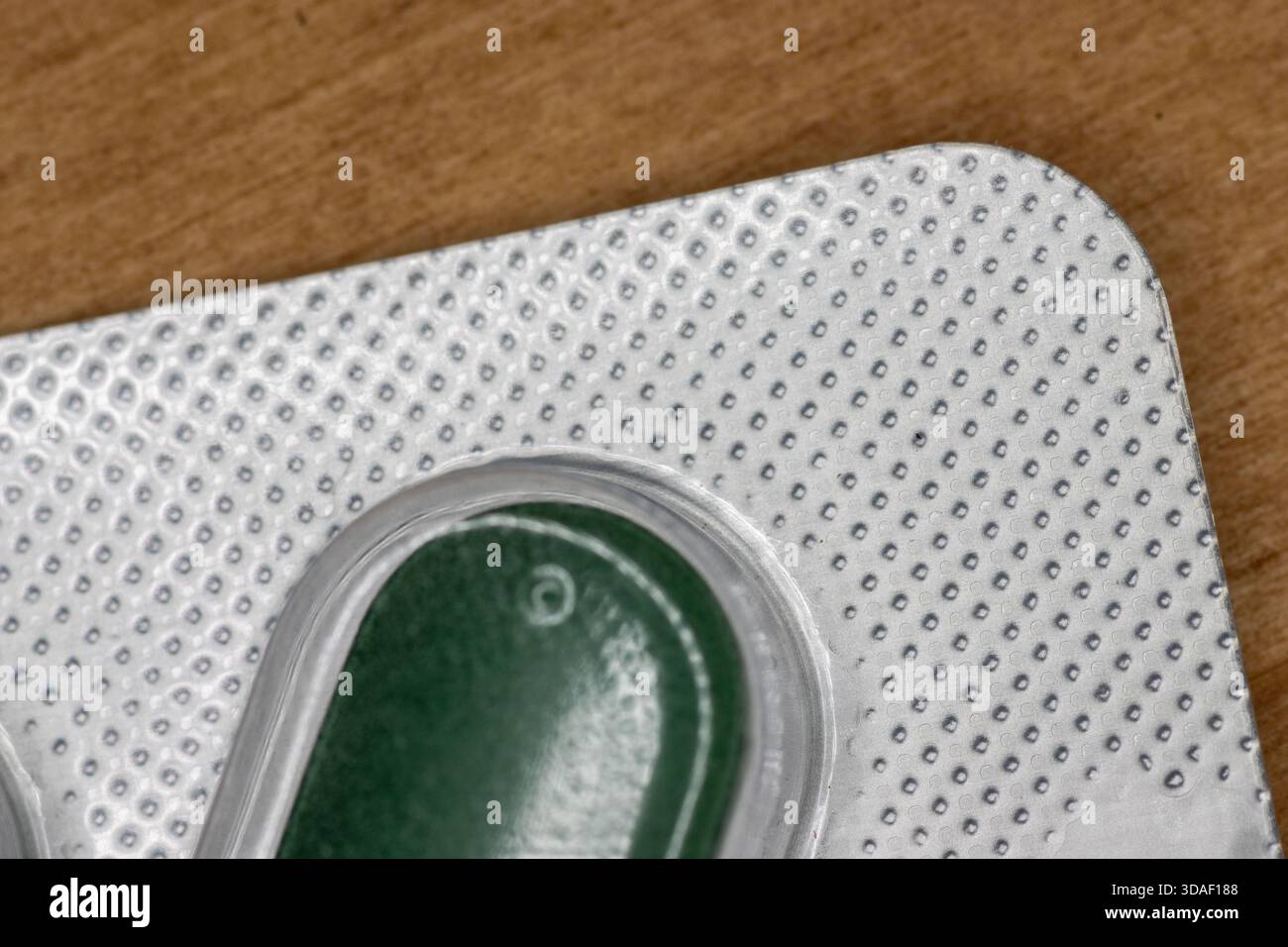 close up detail and isolated of green lozenge shape blister pack ...
