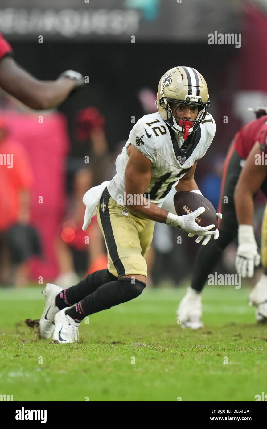 New Orleans Saints wide receiver Chris Olave (12) runs after a catch ...