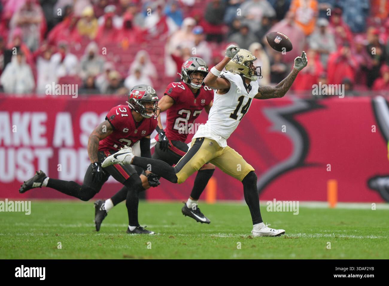New Orleans Saints wide receiver Devaughn Vele (14) tries a one-handed ...