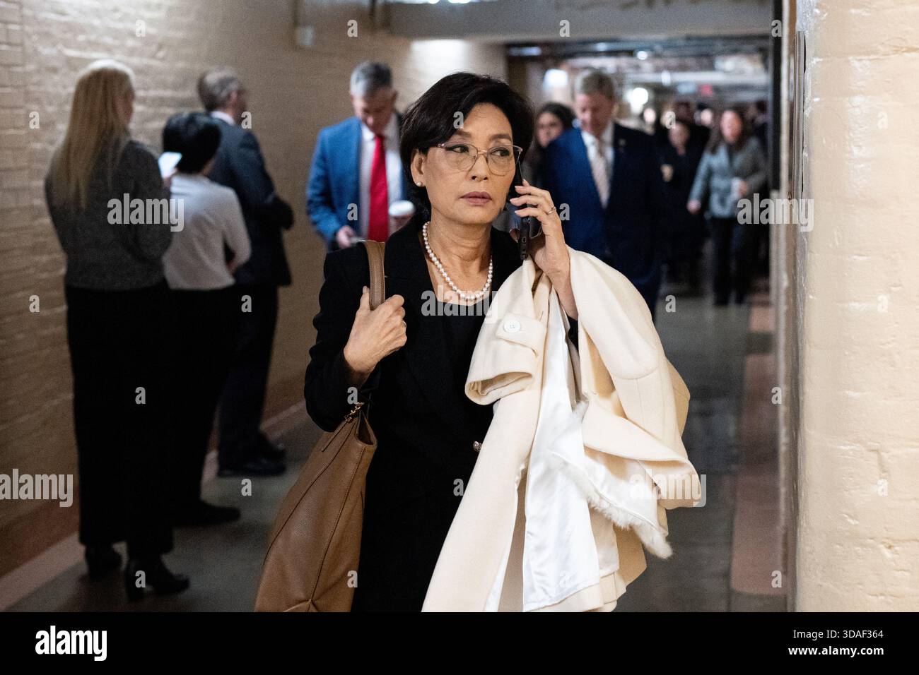 UNITED STATES - DECEMBER 10: Rep. Young Kim, R-Calif., leaves the House ...