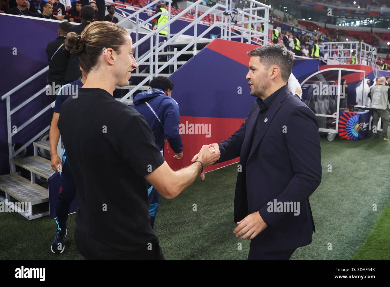 Flamengo's head coach Filipe Luis, left, greets Cruz Azul's head coach ...
