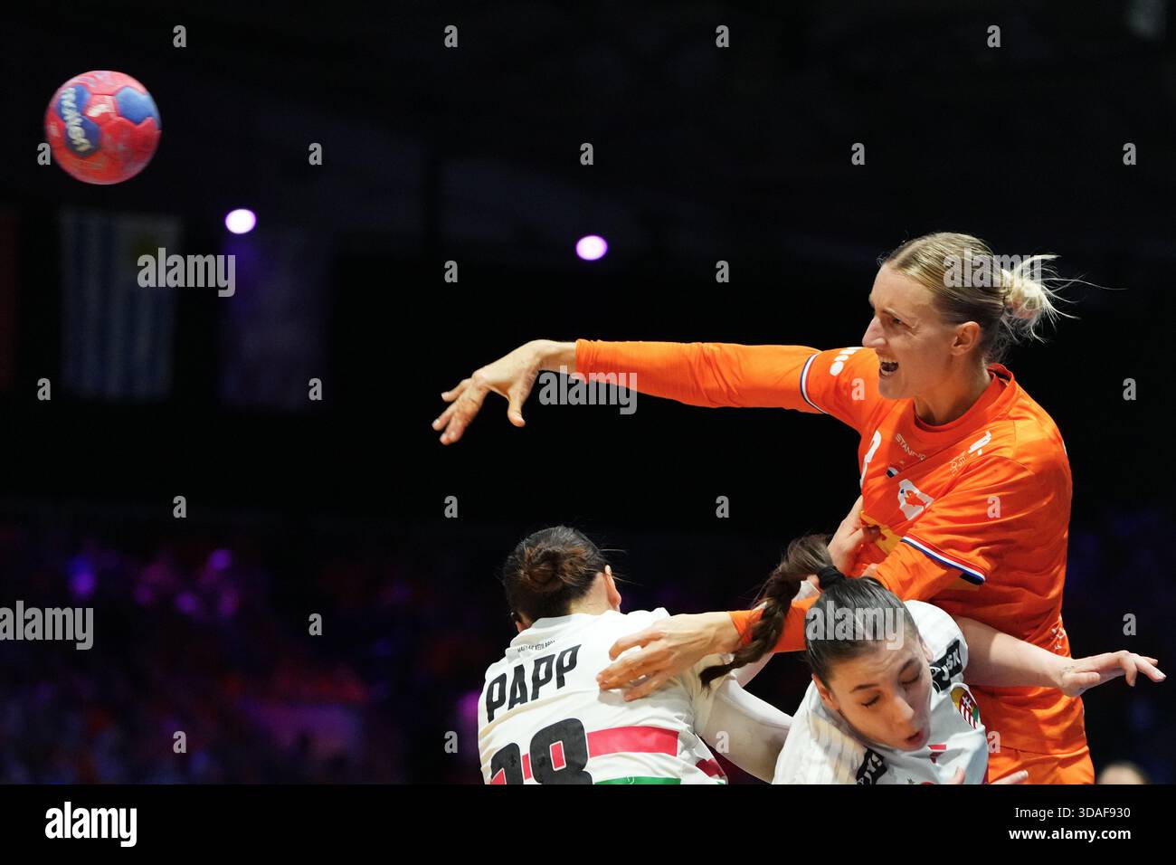 Kelly Dulfer of the Netherlands, top right, tries to score during the ...