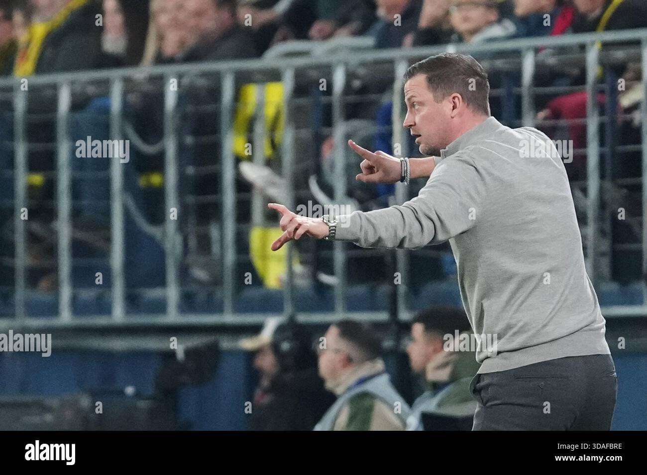 Copenhagen's head coach Jacob Neestrup gives instructions from the side ...