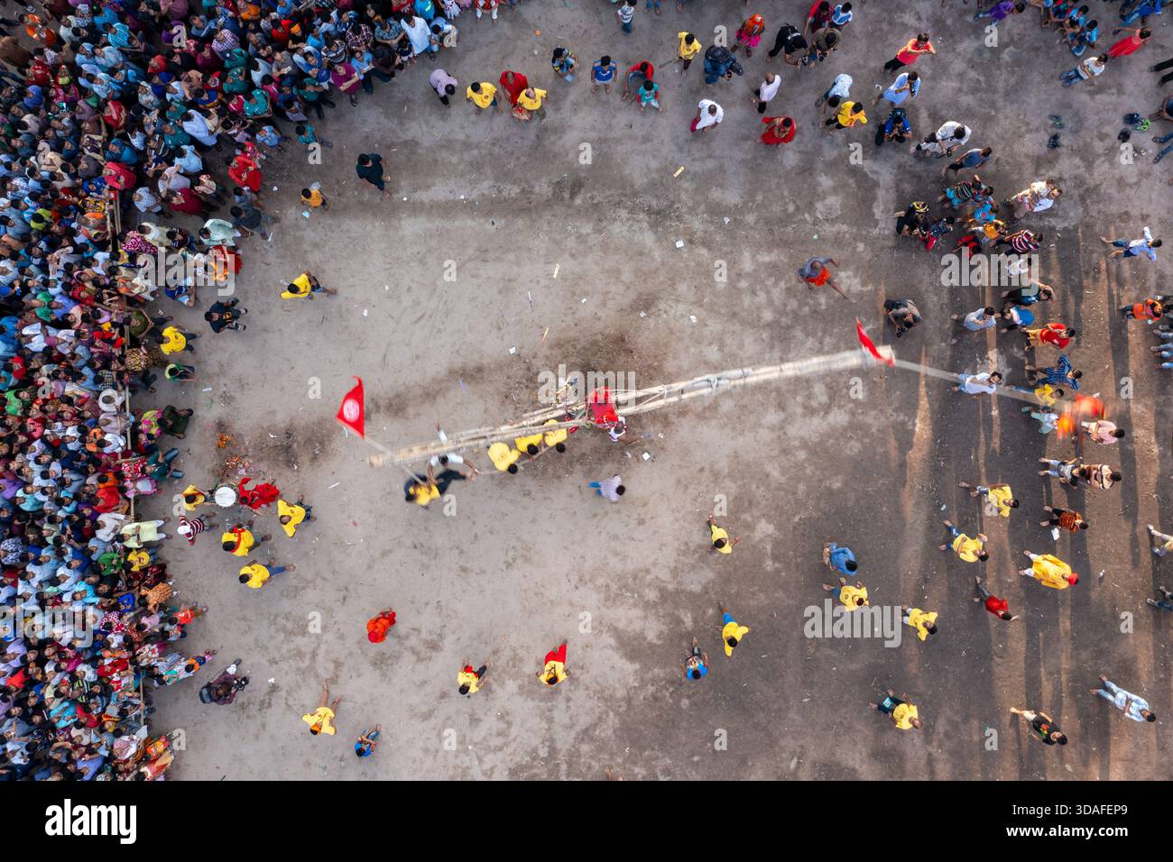 Aerial view of a bustling crowd gathered around a central point marked ...