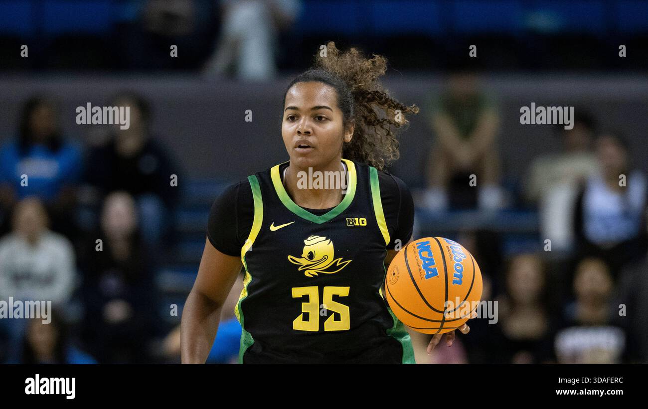 Oregon forward Ehis Etute (35) dribbles during an NCAA basketball game ...