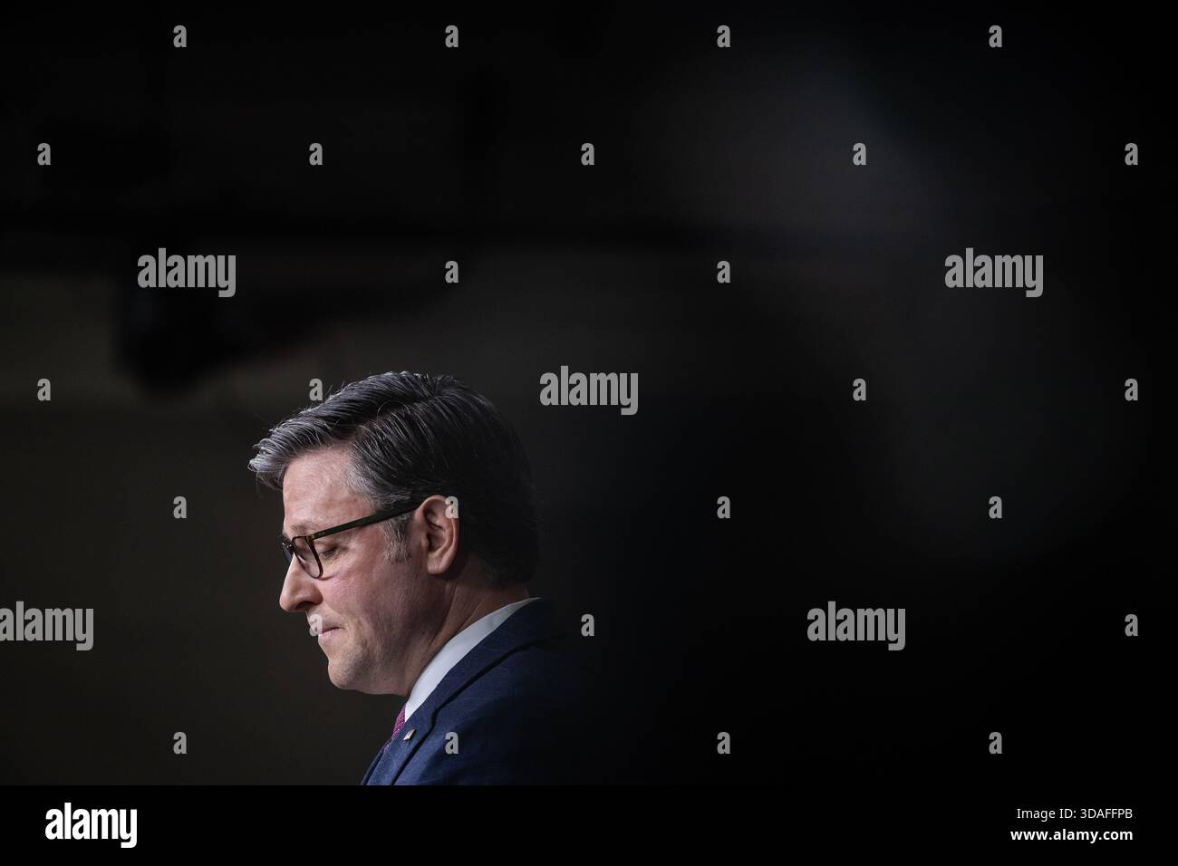 House Speaker Mike Johnson (R-La.) looks on during a press conference ...
