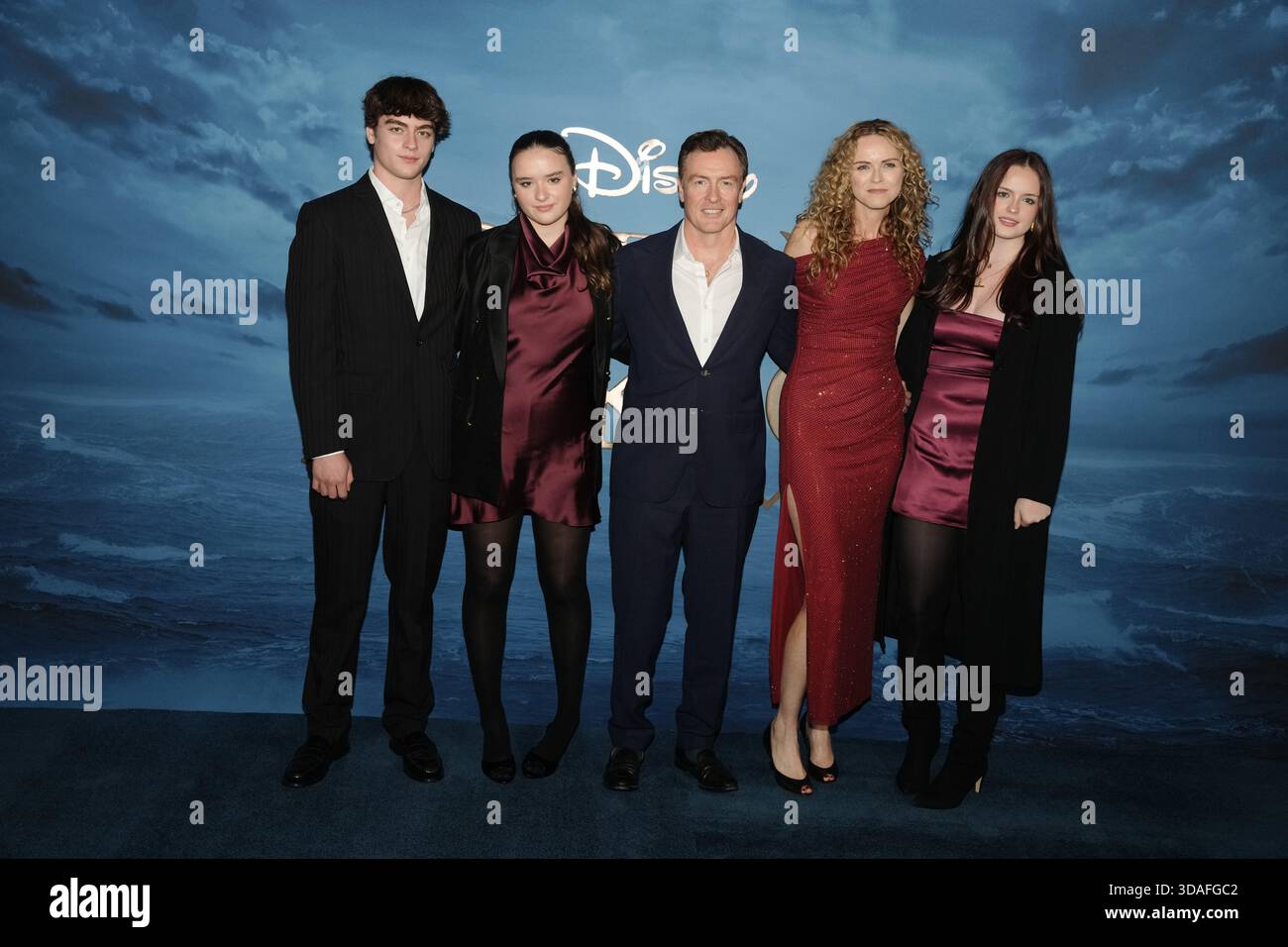 Toby Stephens (centre) and his wife Anna-Louise Plowman (second right ...
