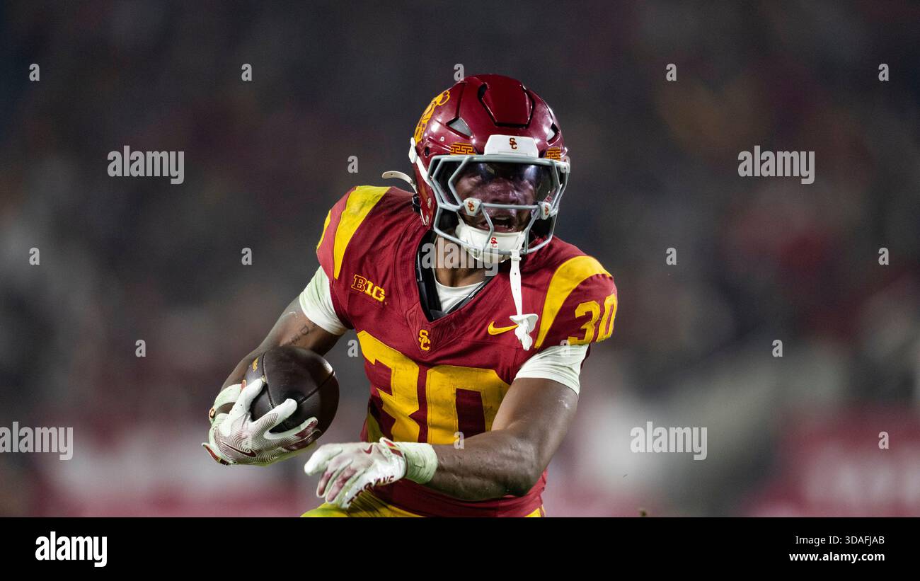 Southern California running back King Miller (30) runs with the ball ...