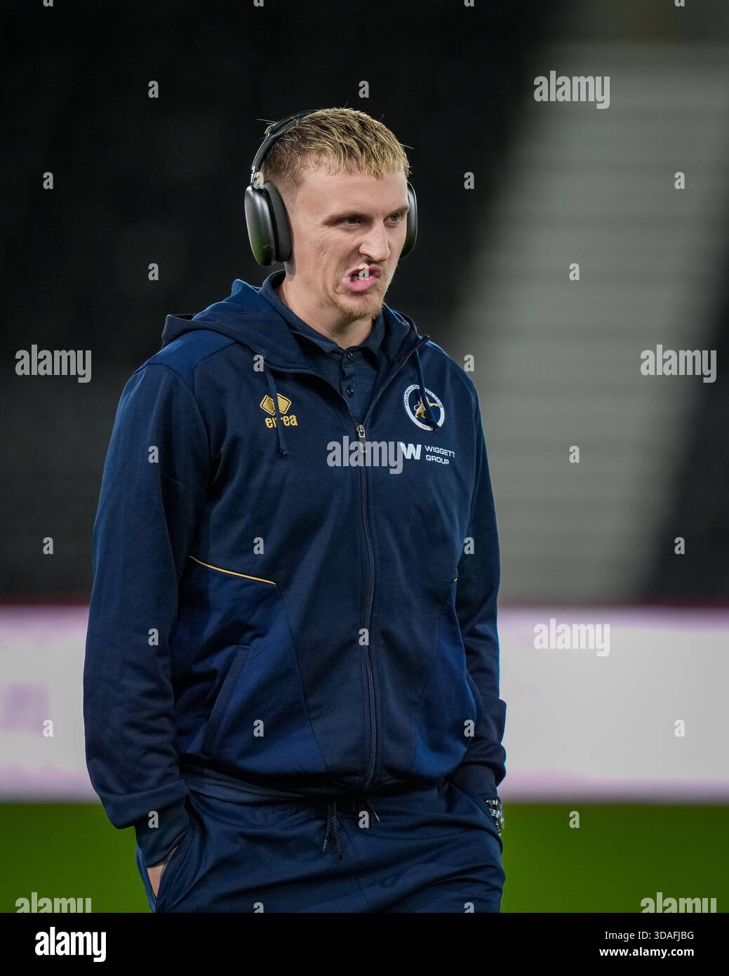 Alfie Doughty of Millwall inspects the pitch during the Sky Bet ...