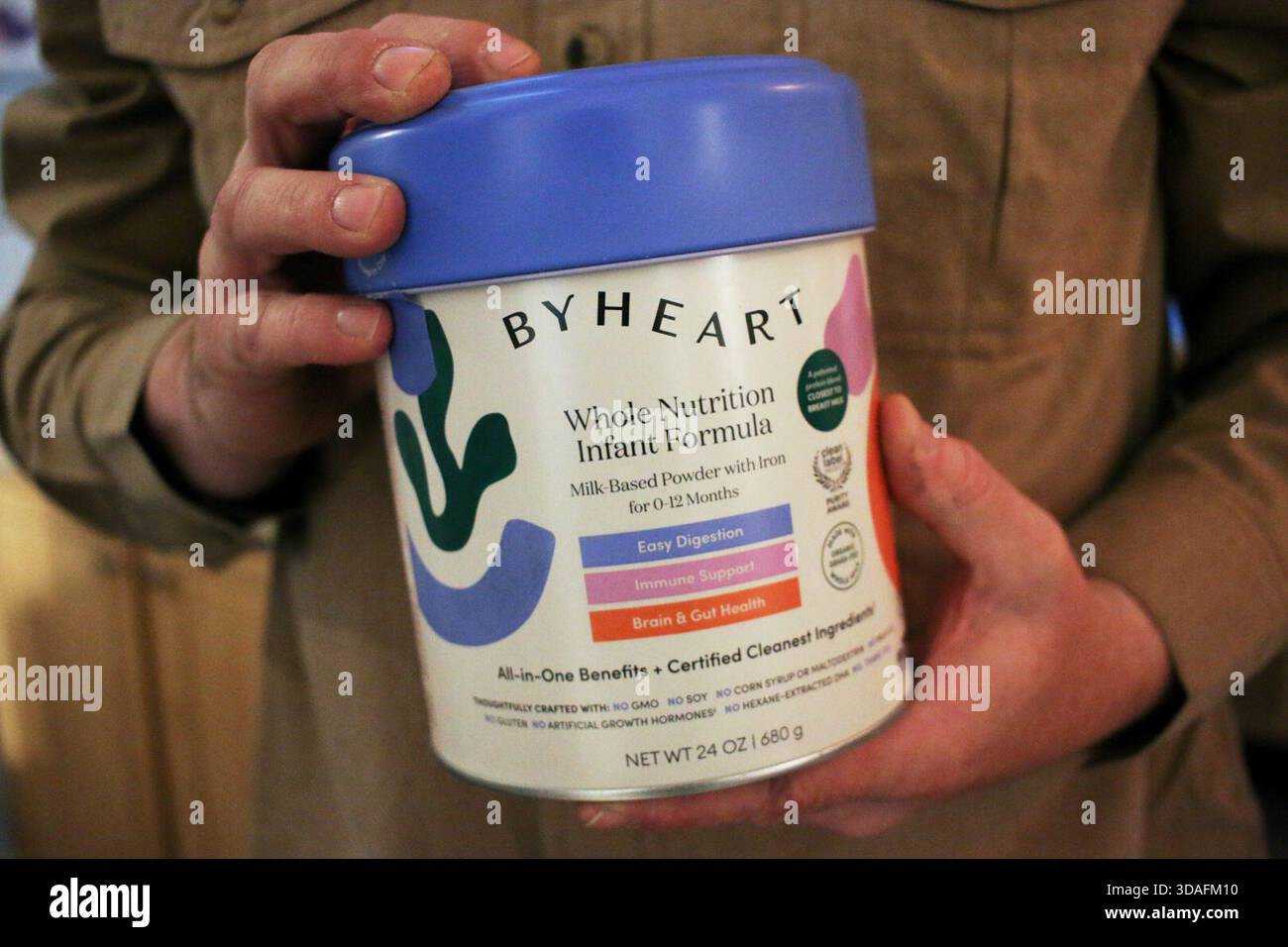 FILE - Stephen Dexter holds a container of ByHeart baby formula, which ...