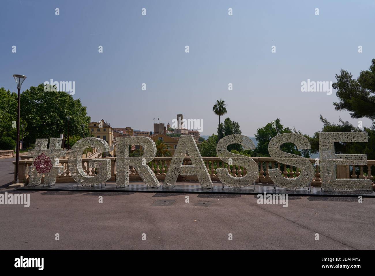 Grasse, France - June 12, 2025 - Grasse sign in France with a view of ...