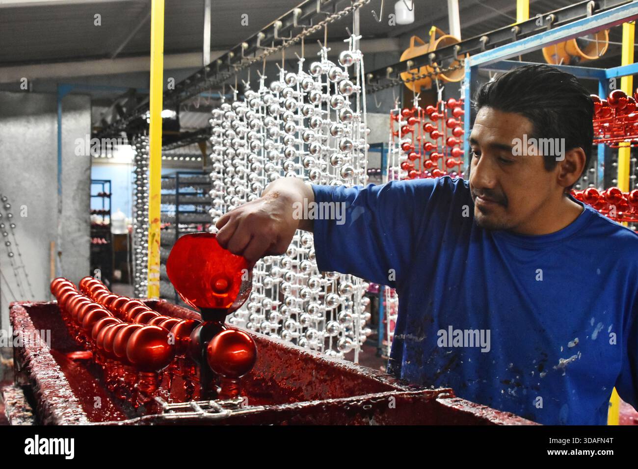 A worker at the Christmas ornament factory 'El Castillo de la Esfera ...