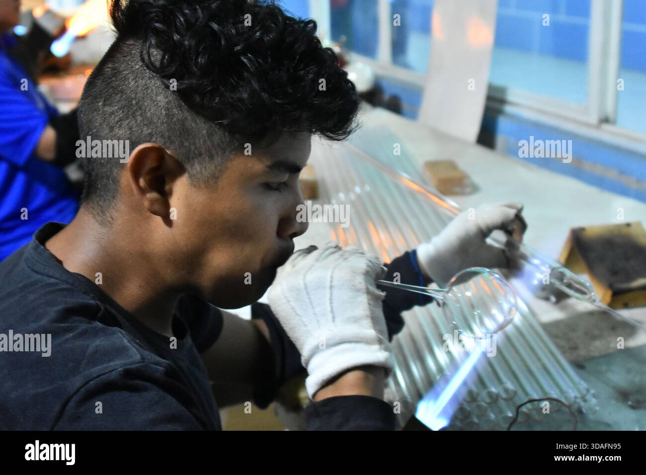 A worker at the Christmas ornament factory 'El Castillo de la Esfera ...