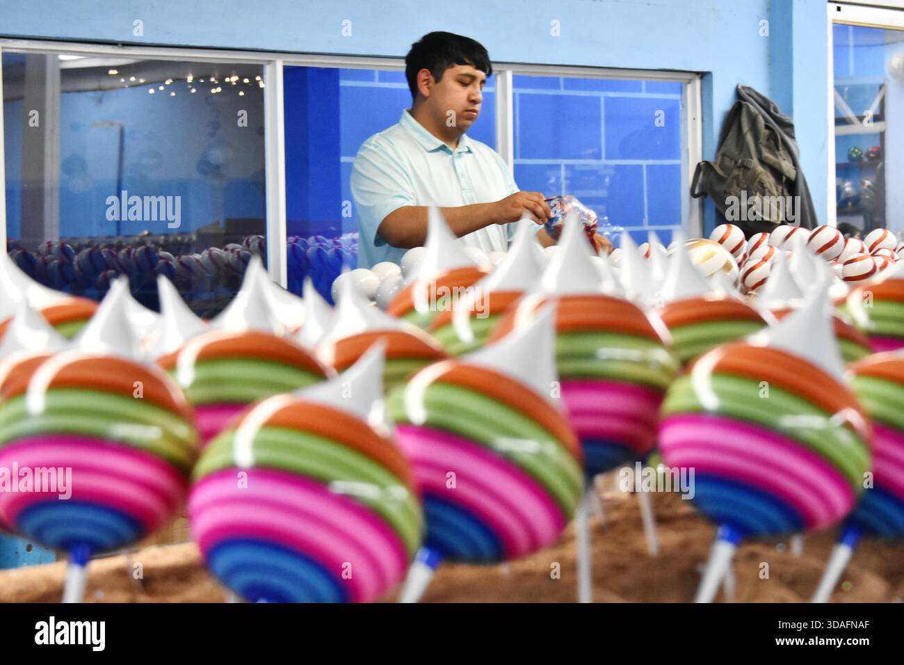 A worker at the Christmas ornament factory 'El Castillo de la Esfera ...
