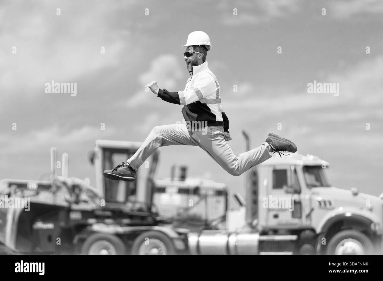 Happy successful excited fast running Black and White Stock Photos ...
