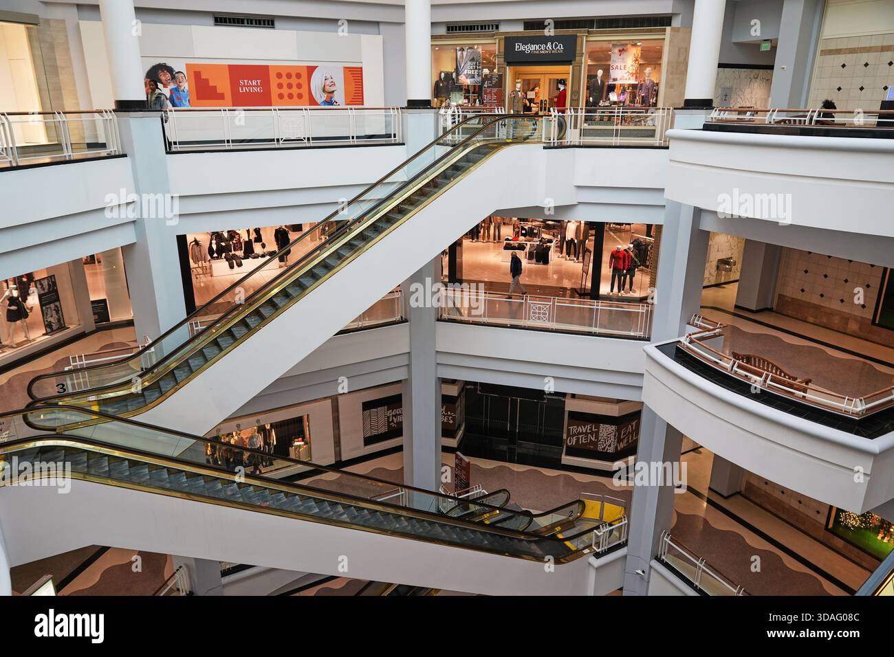 People walk through a shopping mall in Towson, Md., Wednesday, Dec. 10 ...