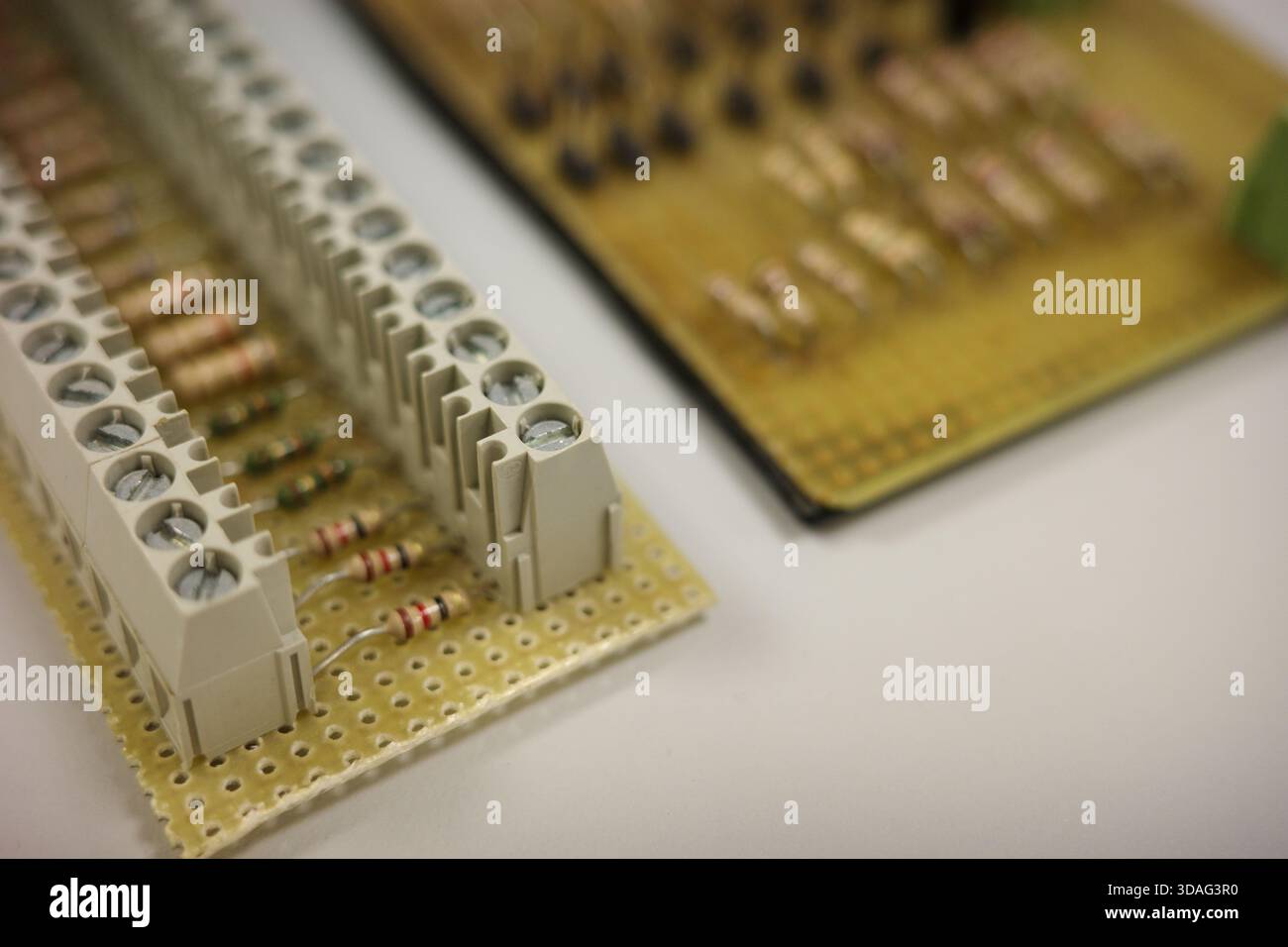 Electronic circuit board with resistors and terminal blocks Stock Photo ...