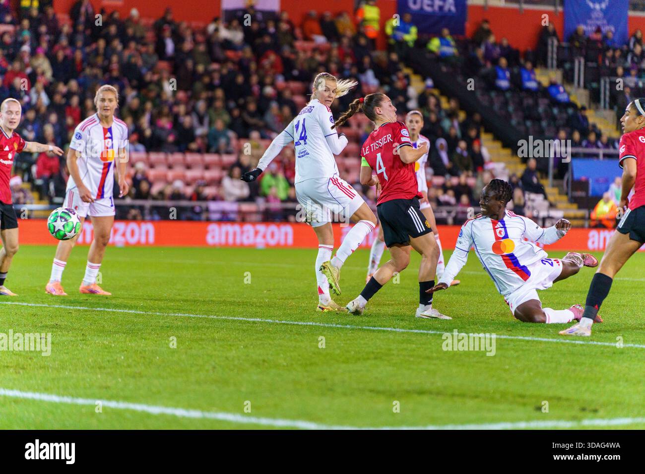 Manchester, UK, 10th Dec 2025: Tabitha Chawinga (right, on floor ...