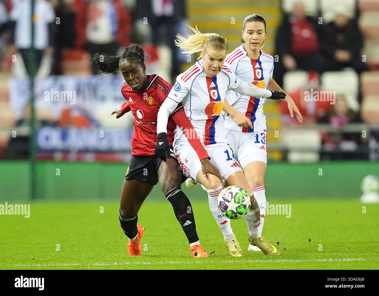 Manchester United's Simi Awujo (left) and OL Lyonnes' Ada Hegerberg ...