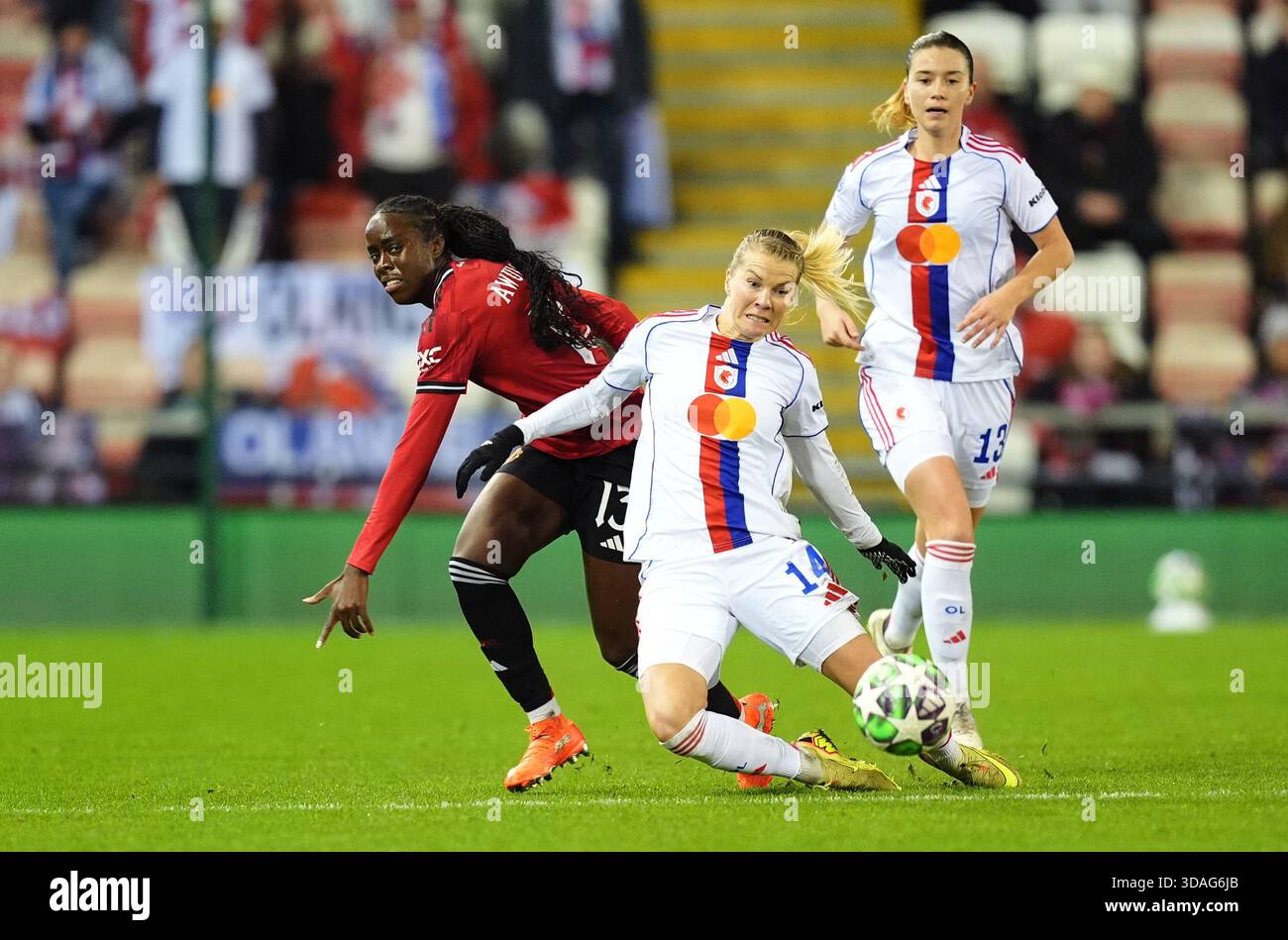Manchester United's Simi Awujo (left) and OL Lyonnes' Ada Hegerberg ...