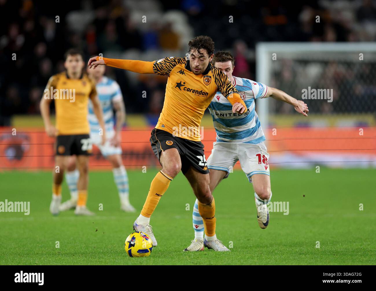 Hull City's Matt Crooks (left) and Wrexham's Ben Sheaf battle for the ...