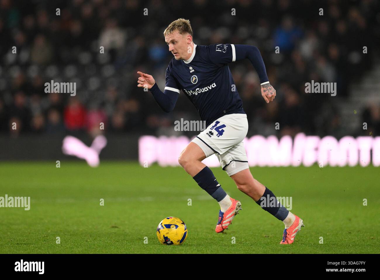Alfie Doughty of Millwall runs with the ball during the Sky Bet ...