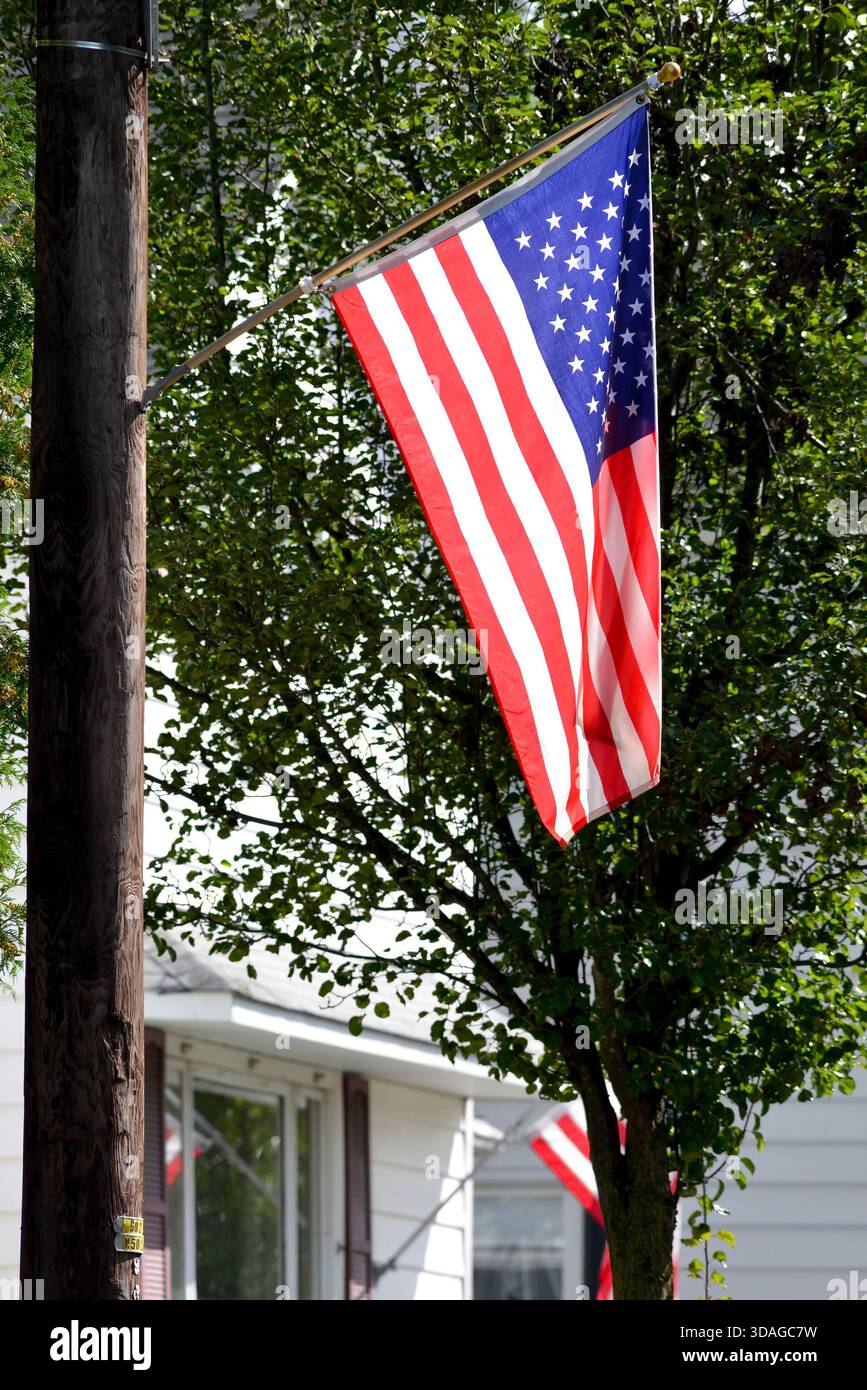 An American flag is flying along the main street in Jermyn Pennsylvania ...