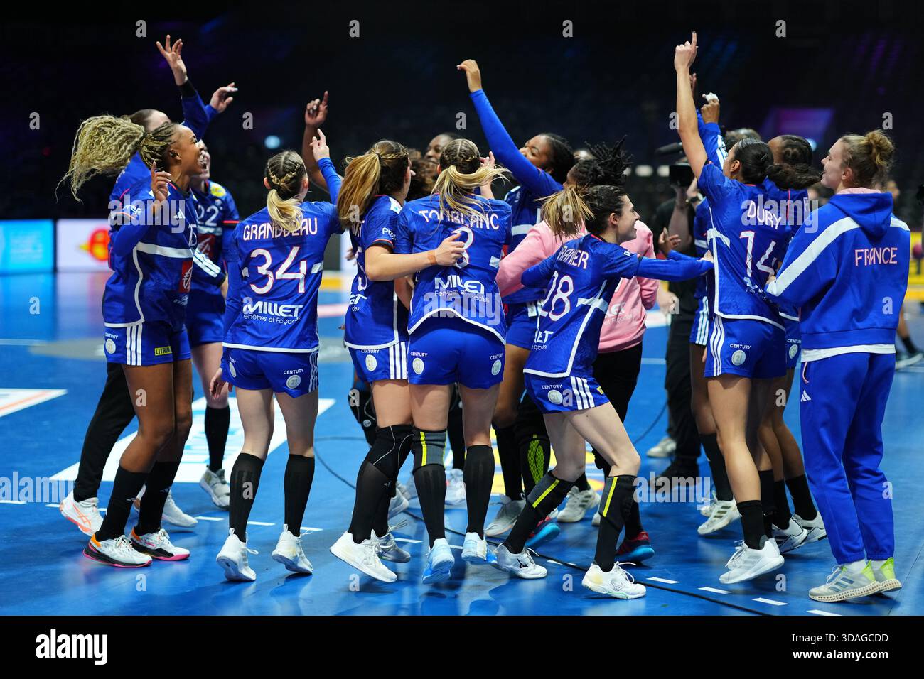 French players celebrate their victory at the end of the women's ...