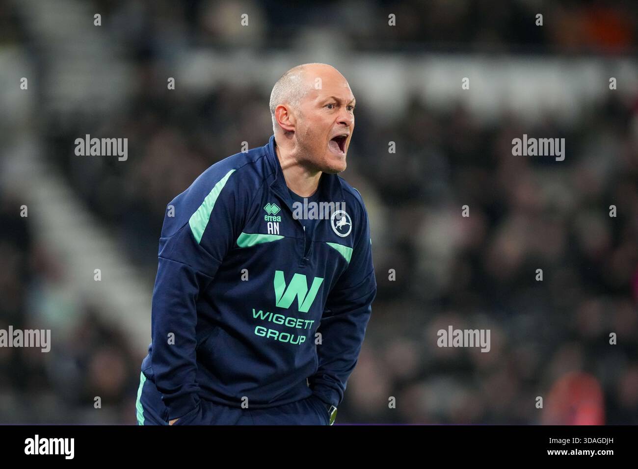 Alex Neil manager of Millwall shouts instructions to his team during ...