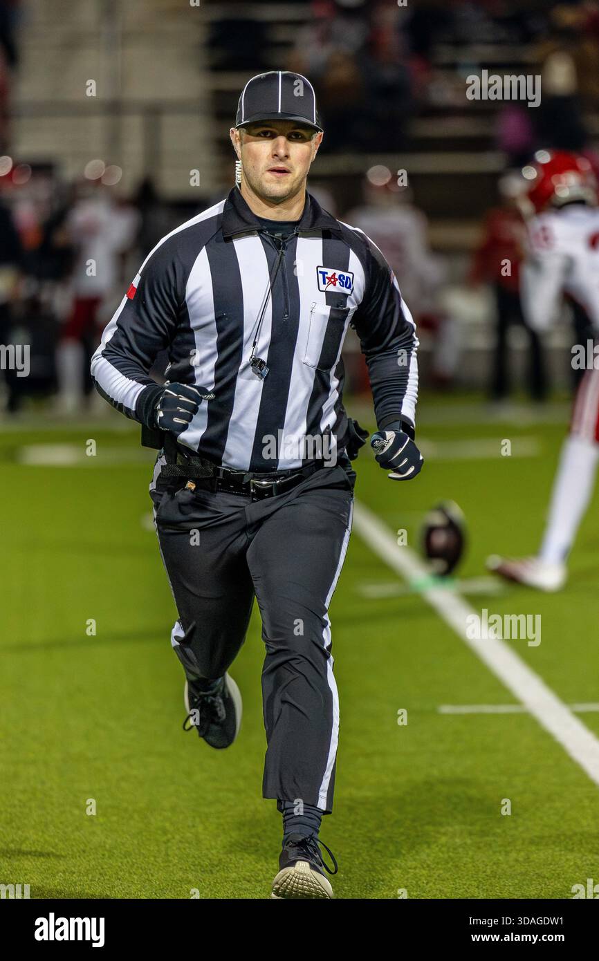 Tyler, TX. USA; the back judge clears the field before a kickoff during ...